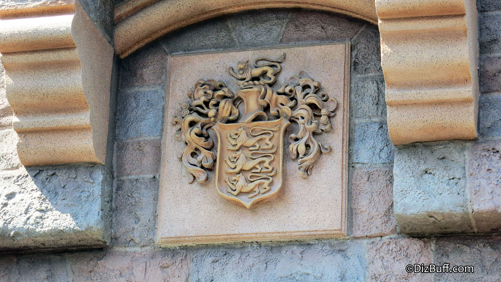 Disney Family Crest on Sleeping Beauty Castle - DizBuff.com